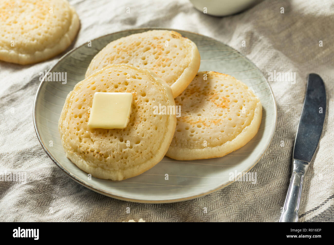 Buttered toasted crumpets hi-res stock photography and images - Alamy