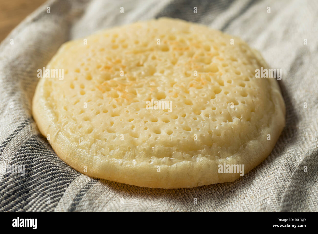 Homemade Grilled British Crumpets with Butter for Breakfast Stock Photo ...