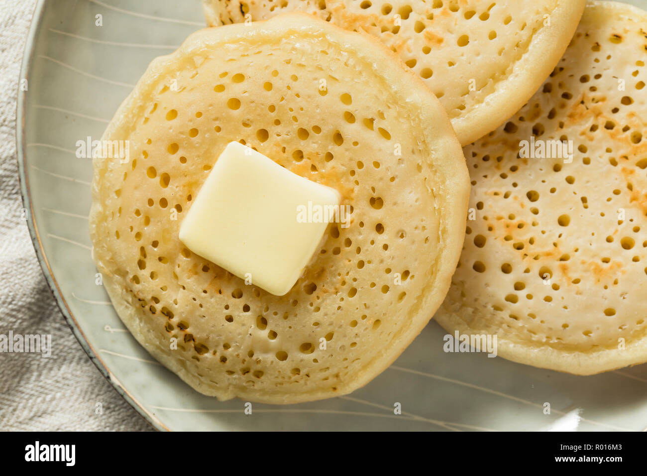 Crumpets with butter hi-res stock photography and images - Alamy