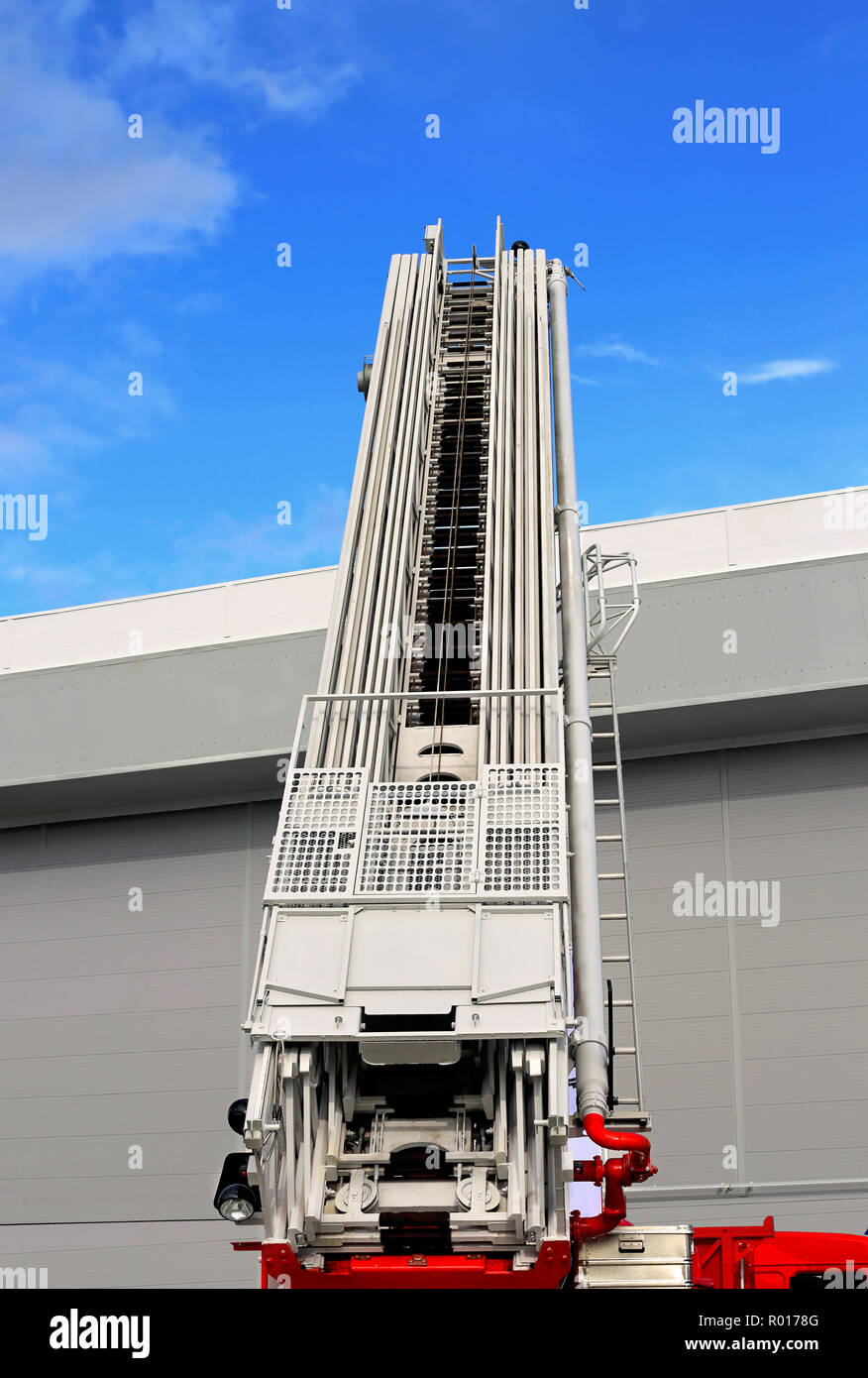 Fire ladder: supporting frame with lift actuator and retractable spans ...