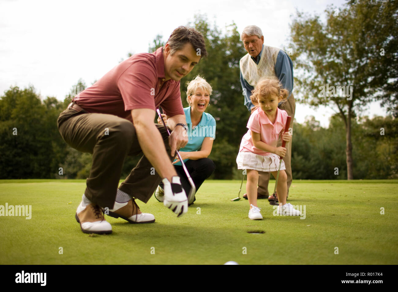 Kids golfing hi-res stock photography and images - Alamy