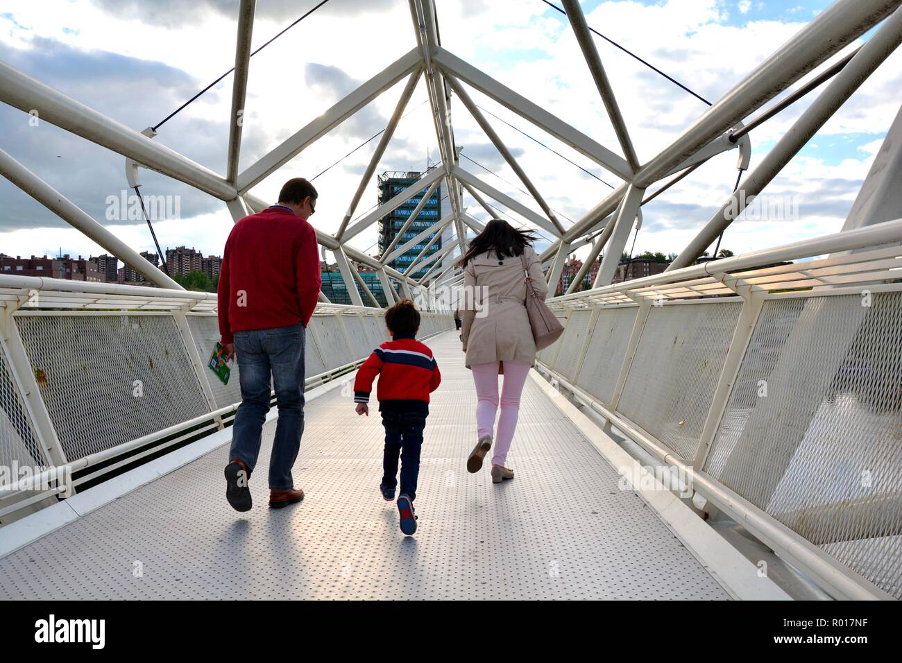 Family crossing a bridge hi-res stock photography and images - Alamy