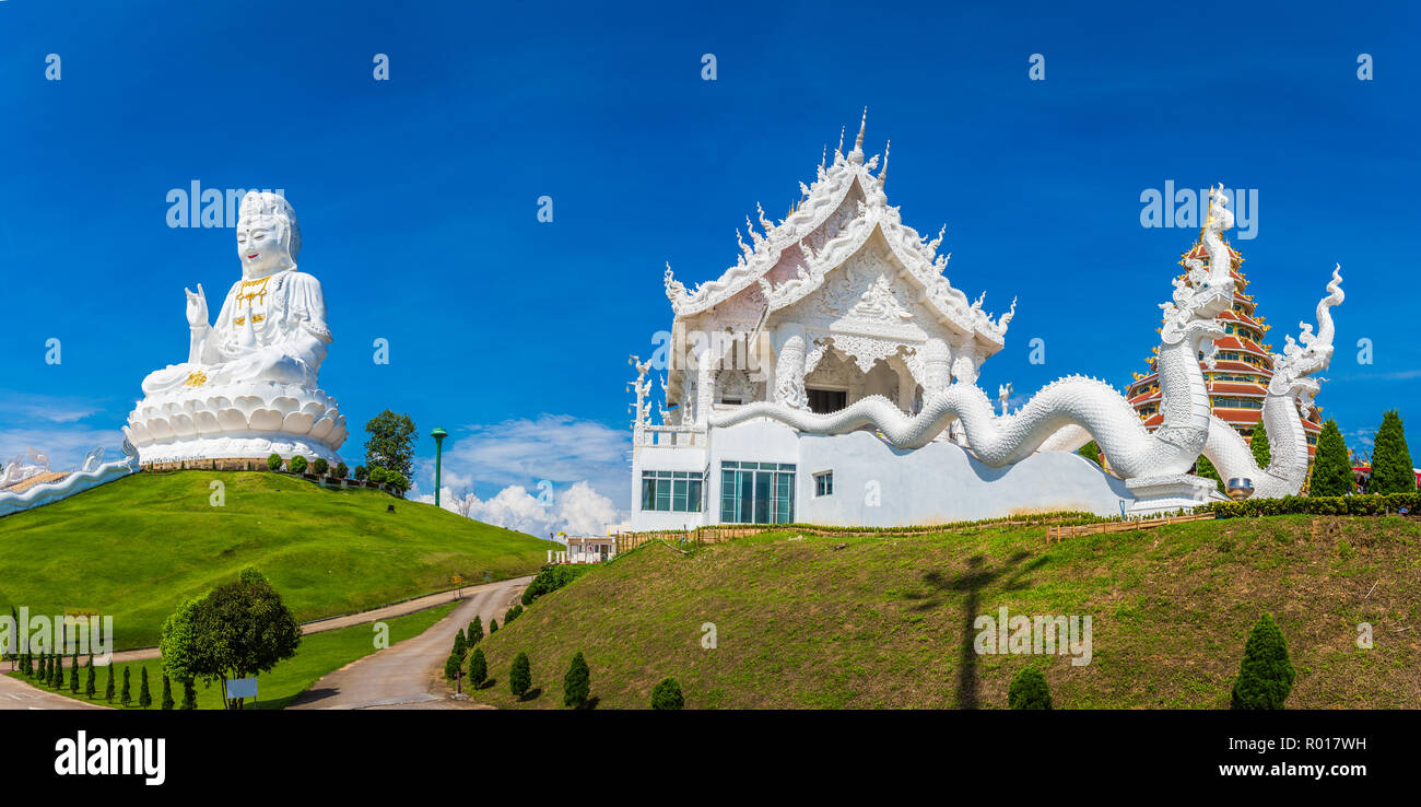 Landscape of Wat Huay Pla Kung temple with white temple and Statue of ...
