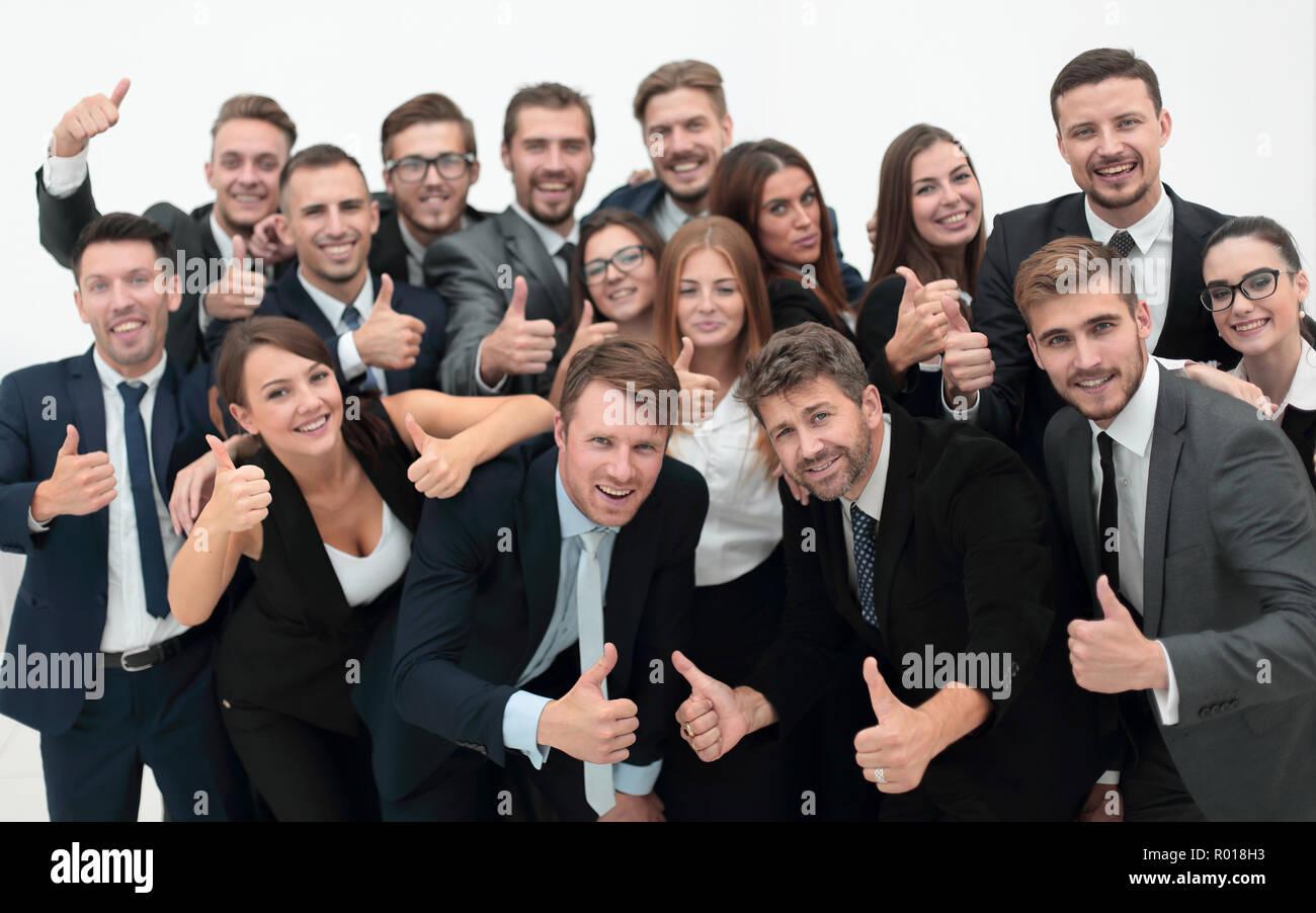 successful business team showing thumbs up Stock Photo - Alamy