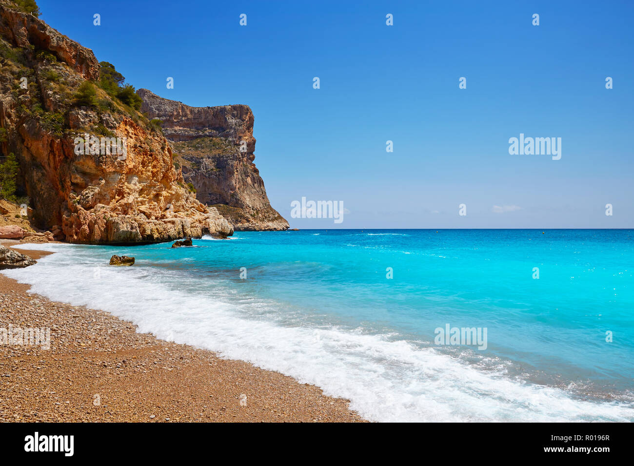 Cala del Moraig beach in Benitachell of Alicante at Spain Stock Photo ...
