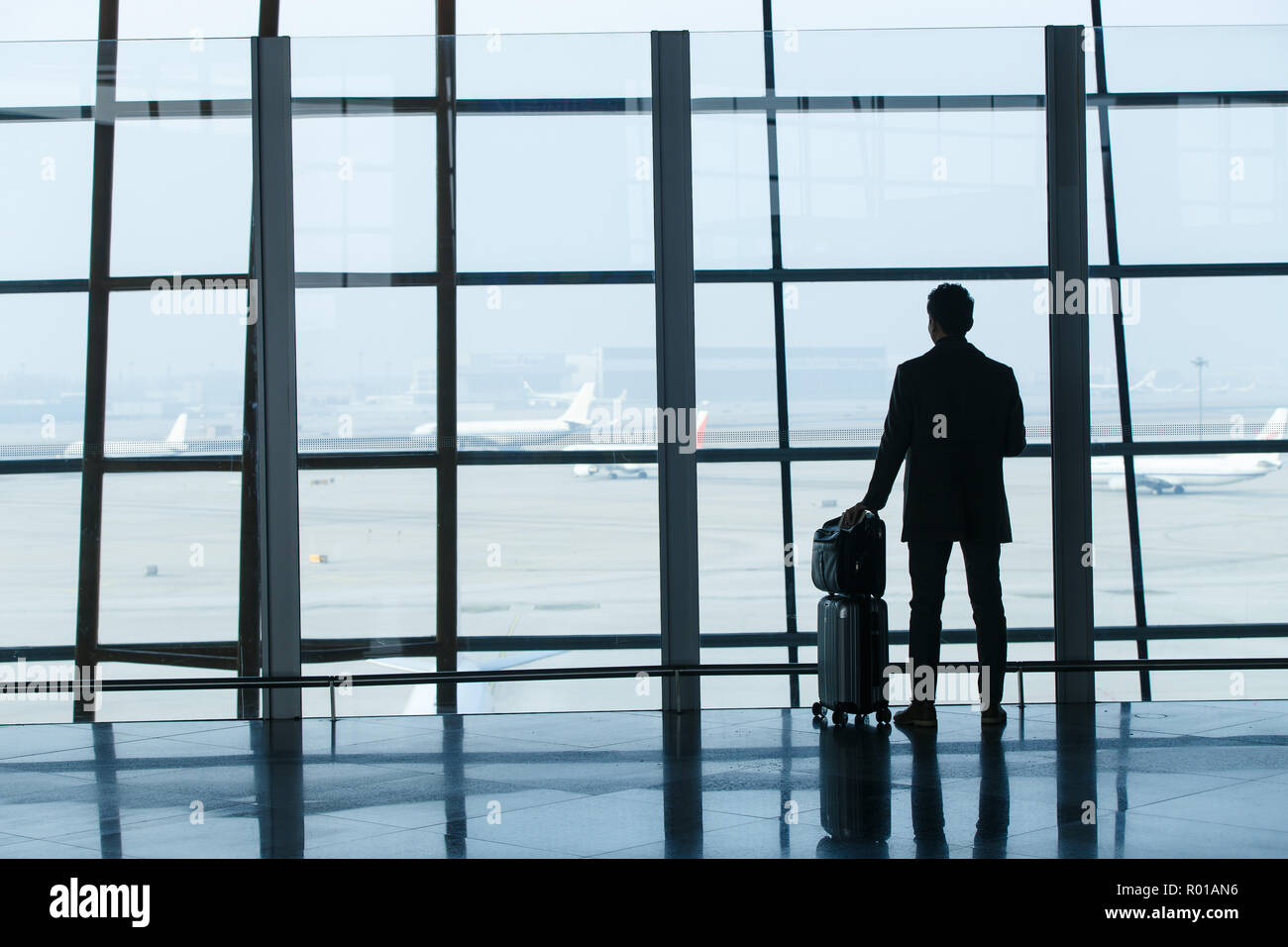 Business man at the airport Stock Photo - Alamy