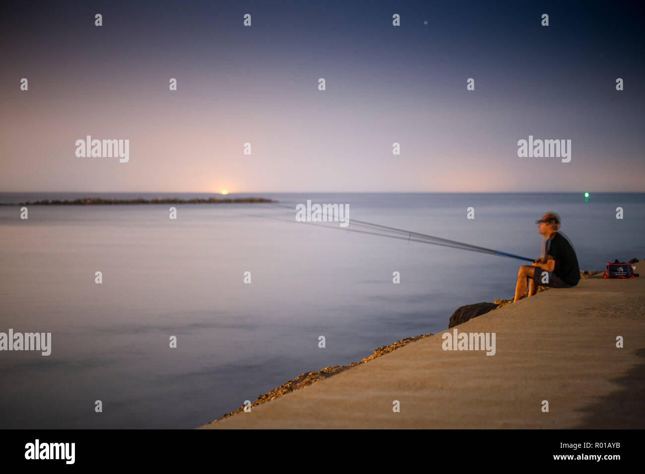 Night fishing sitting hi-res stock photography and images - Alamy