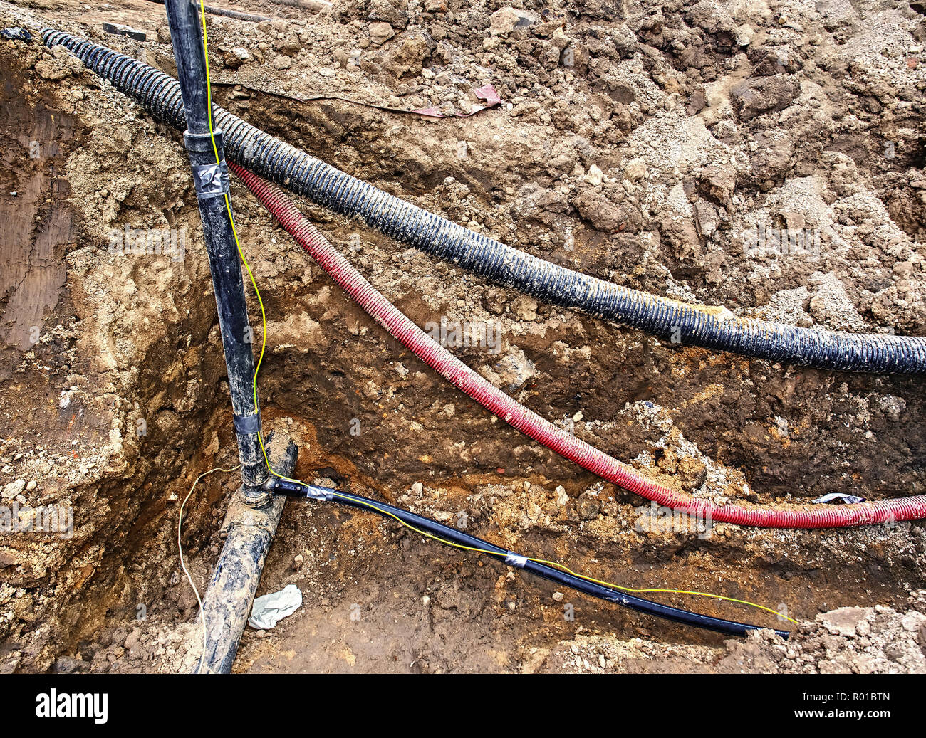 Building of lines of metallic and fiber optic cables of communication ...