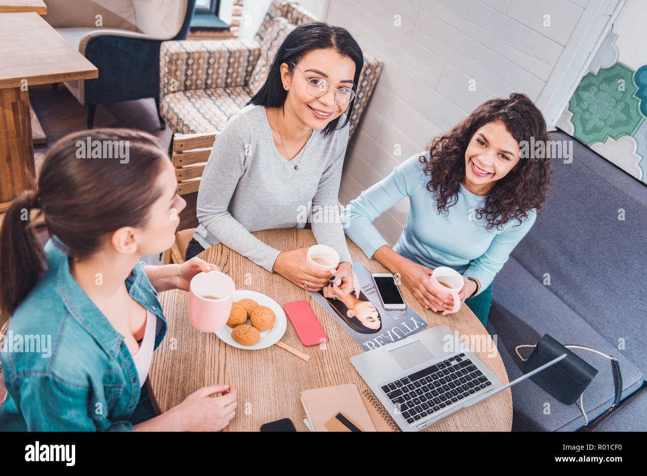 Top view women colleagues meeting hi-res stock photography and images ...