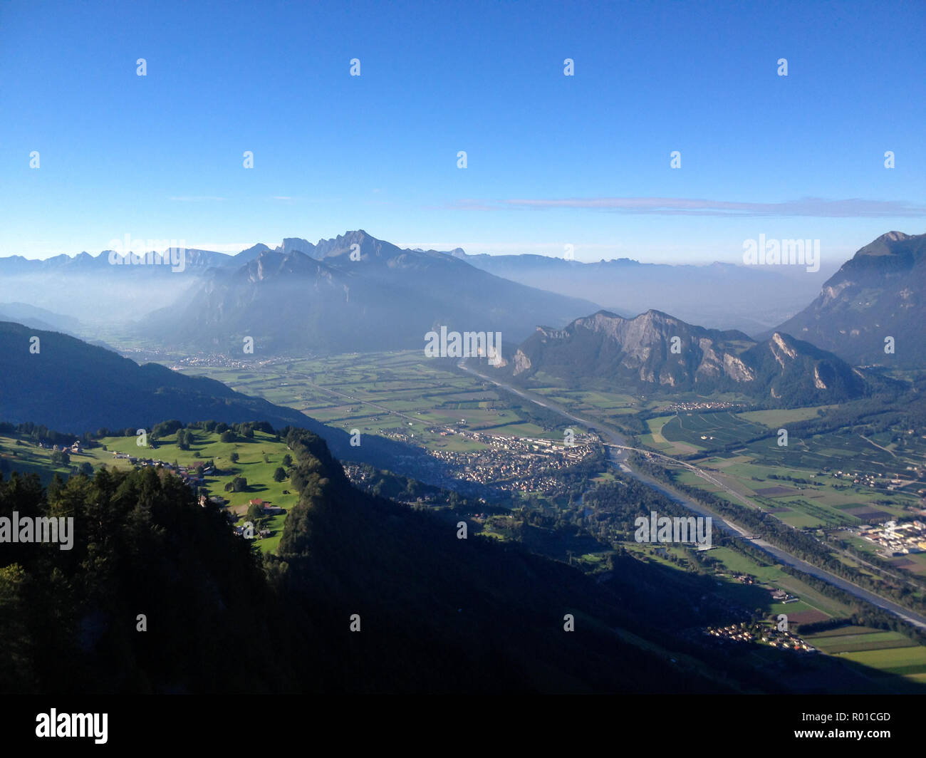 view from a high alpine mountain peak in Switzerland with a great view ...