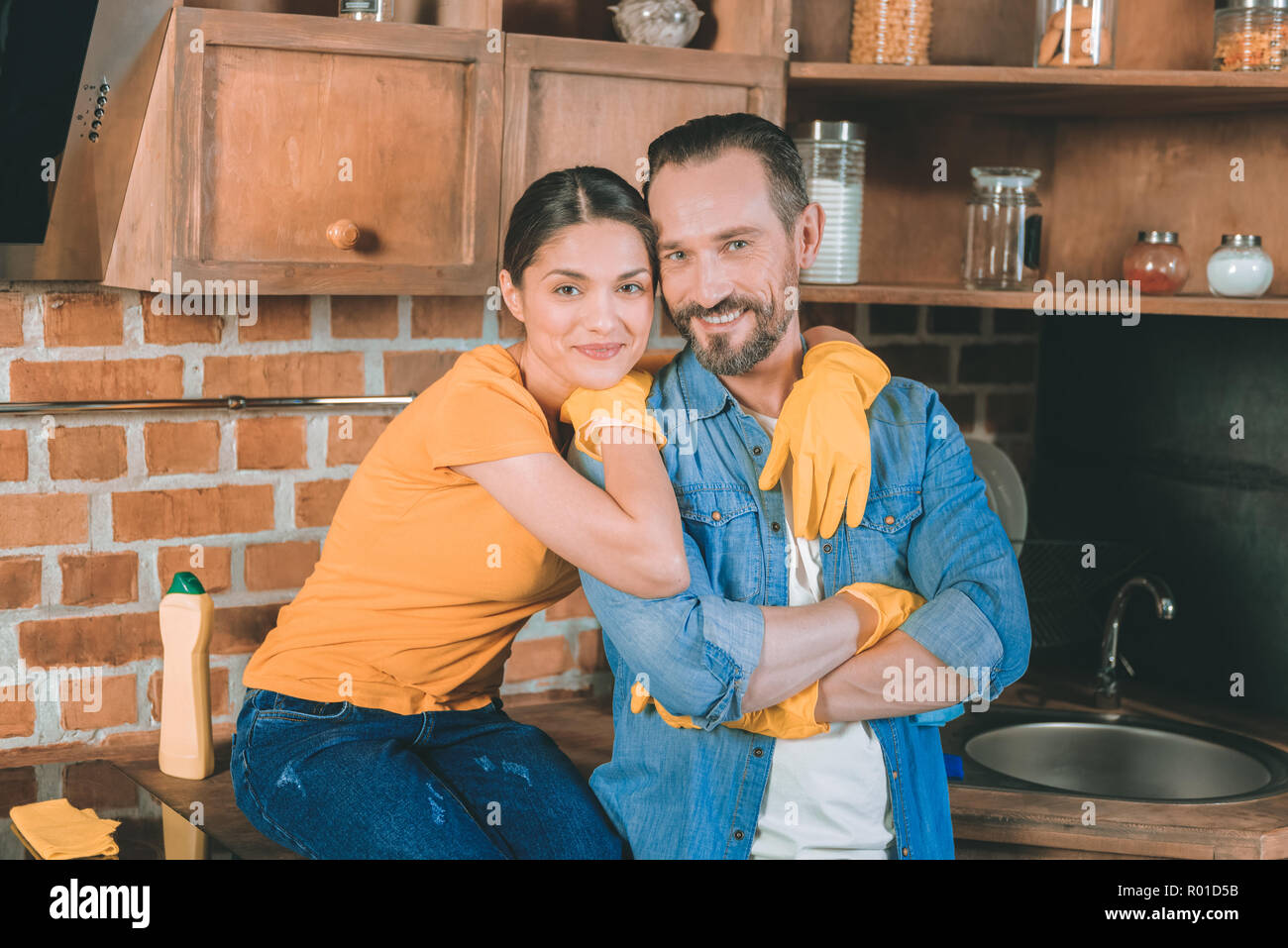 Tender girl embracing her husband Stock Photo - Alamy