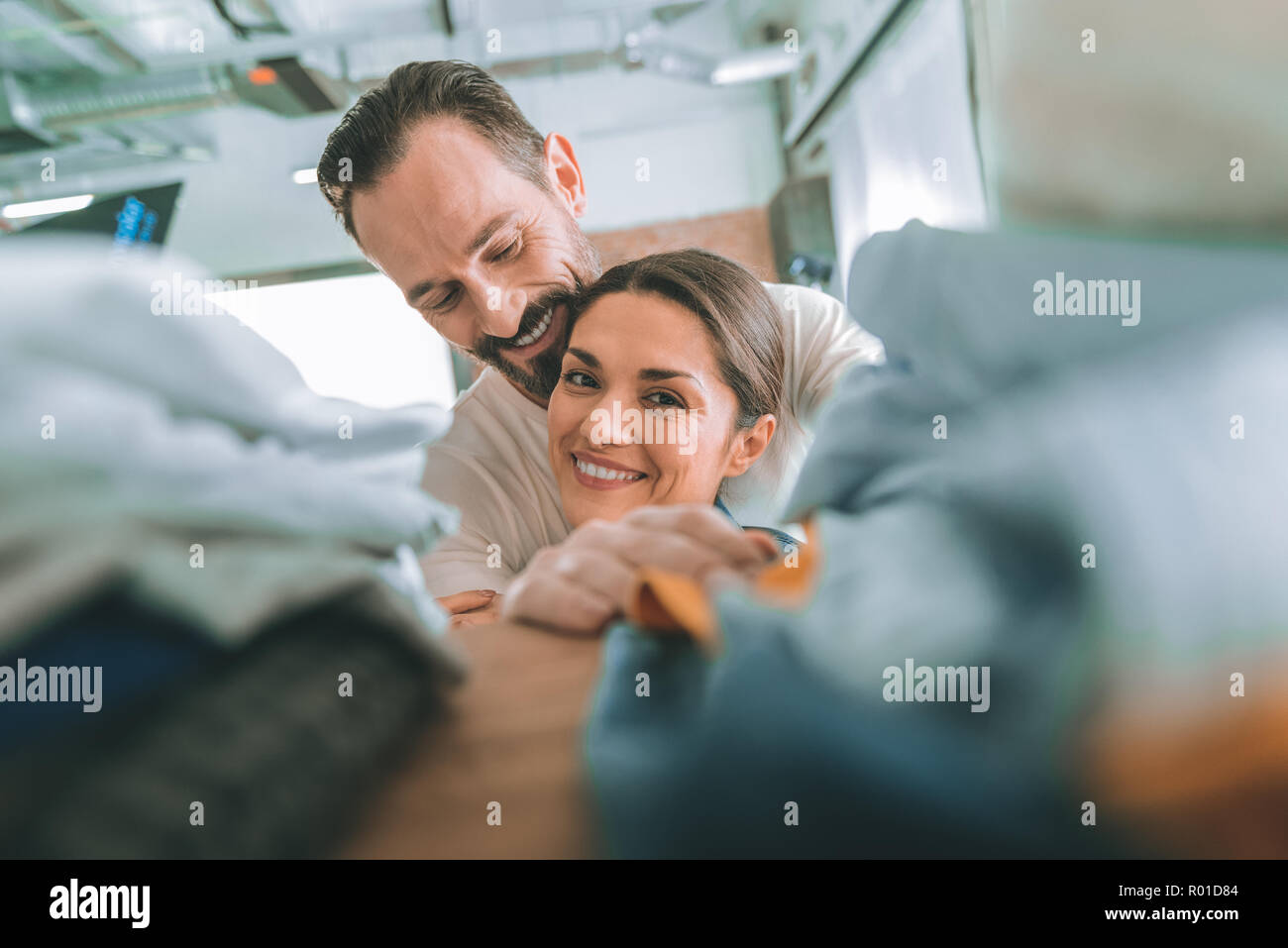 Positive delighted couple spending weekend together Stock Photo - Alamy