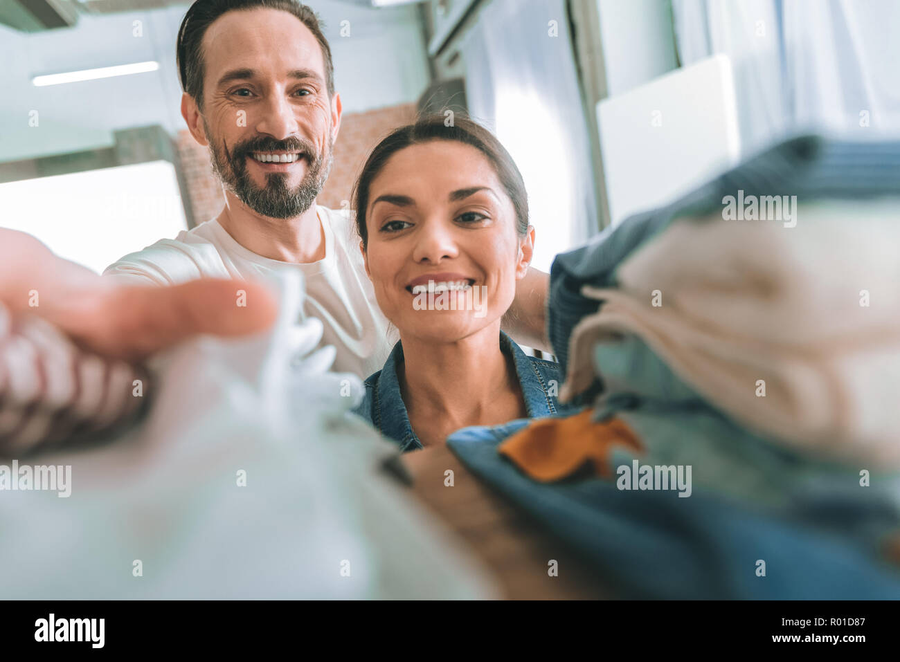Taking clothes hi-res stock photography and images - Alamy