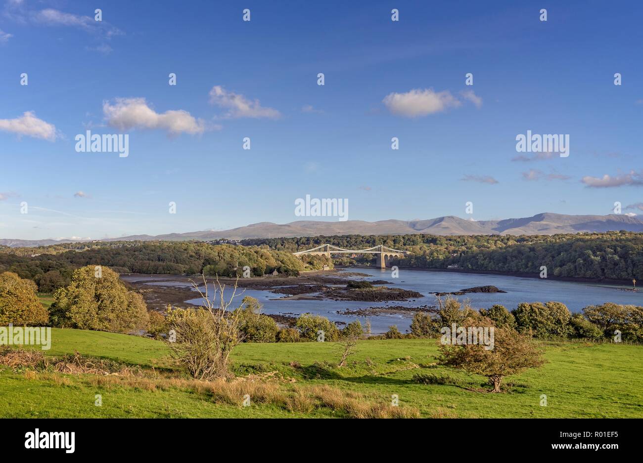 Classic view of the Menai Straits with the Menai Suspension Bridge. The ...