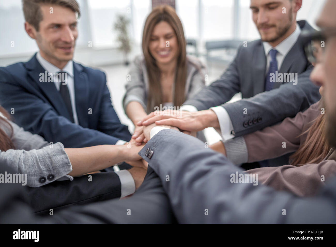 group of business people showing their unity Stock Photo - Alamy