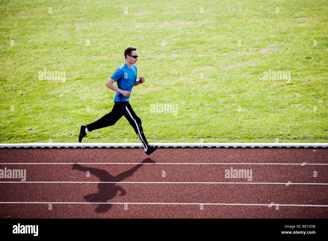 Professional runner training Stock Photo - Alamy