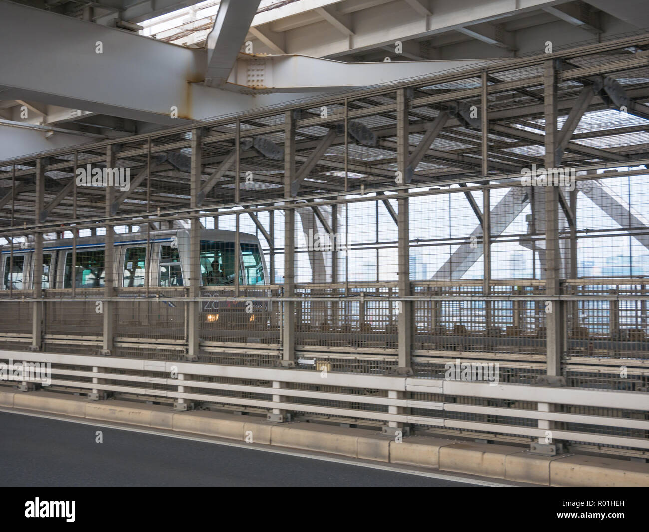 Train at Yurikamome line on the Rainbow bridge in Tokyo, Japan Stock ...