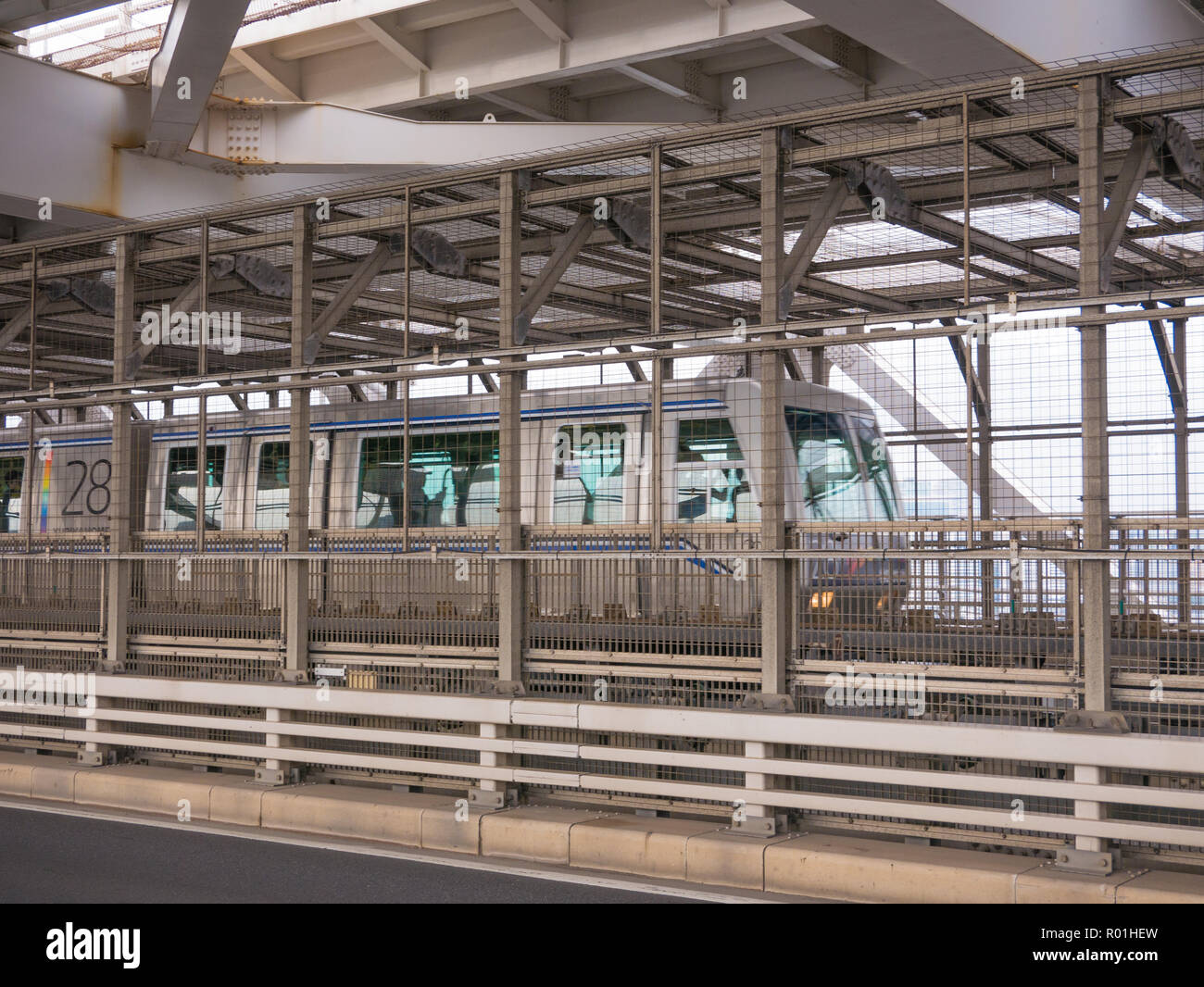 Train at Yurikamome line on the Rainbow bridge in Tokyo, Japan Stock ...