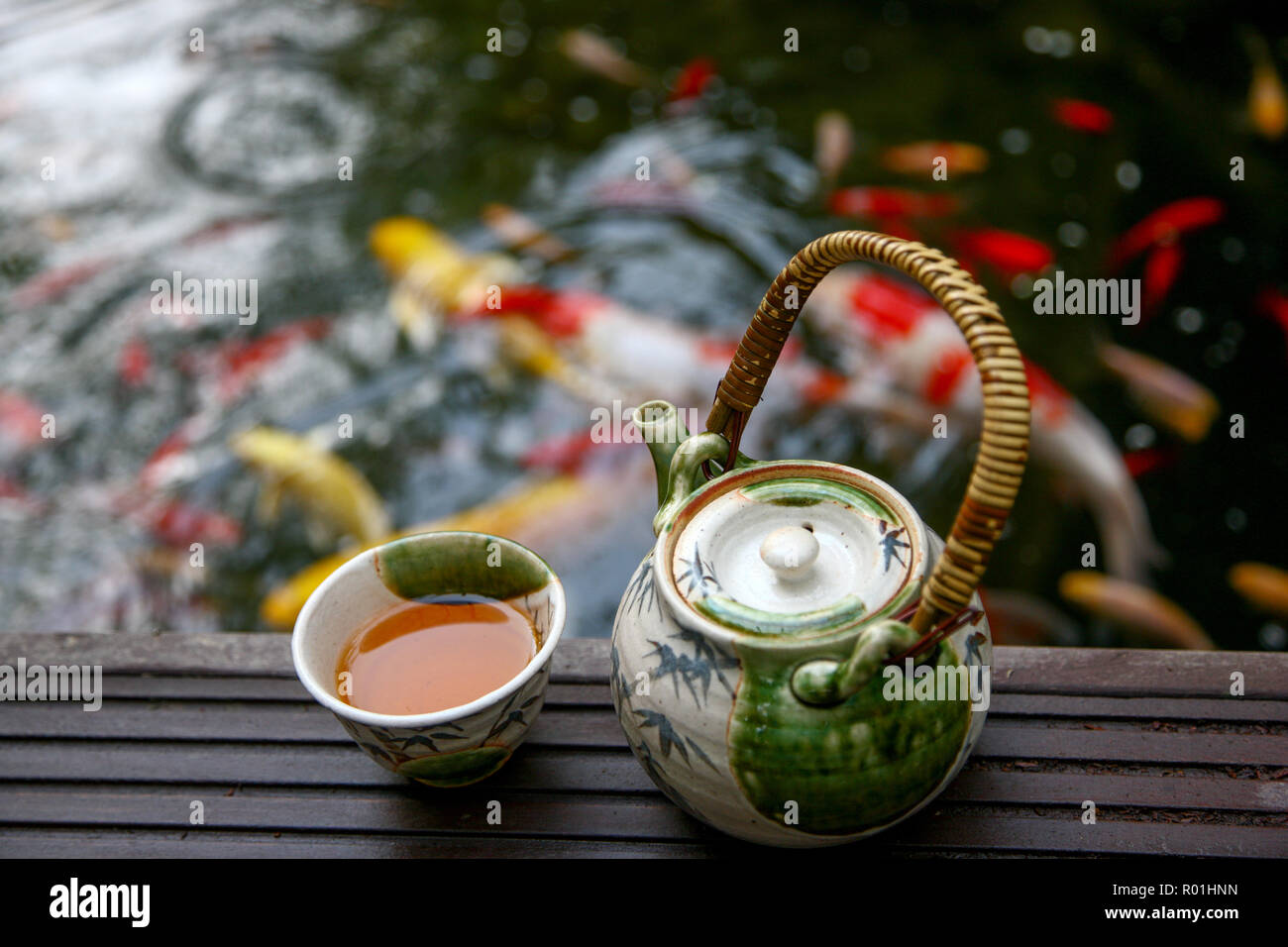 Tea set the goldfish Stock Photo - Alamy