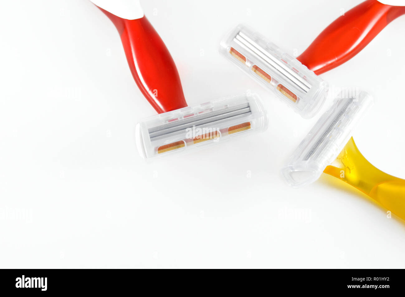 Red and Yellow Disposable Razors Isolated on White Background Stock ...