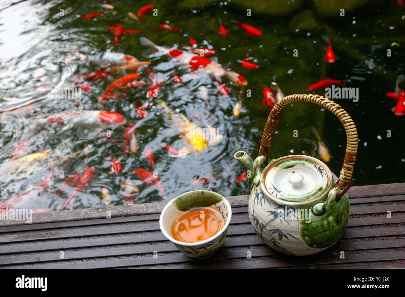 Tea set the goldfish Stock Photo - Alamy