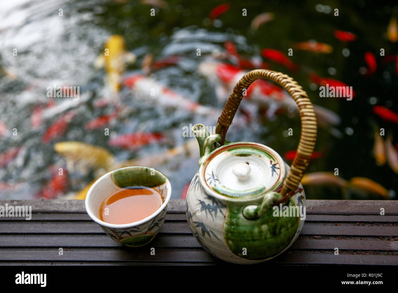 Tea set the goldfish Stock Photo - Alamy