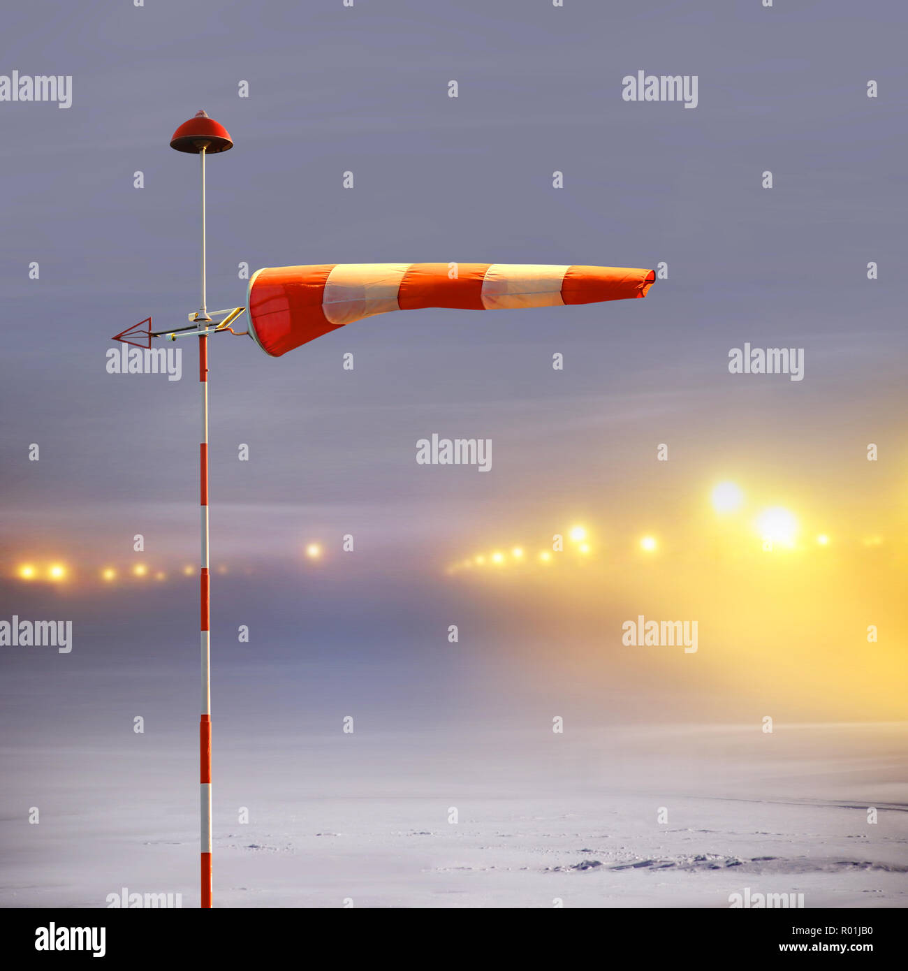Meteorology windsock inflated by wind in airport at non-flying night ...