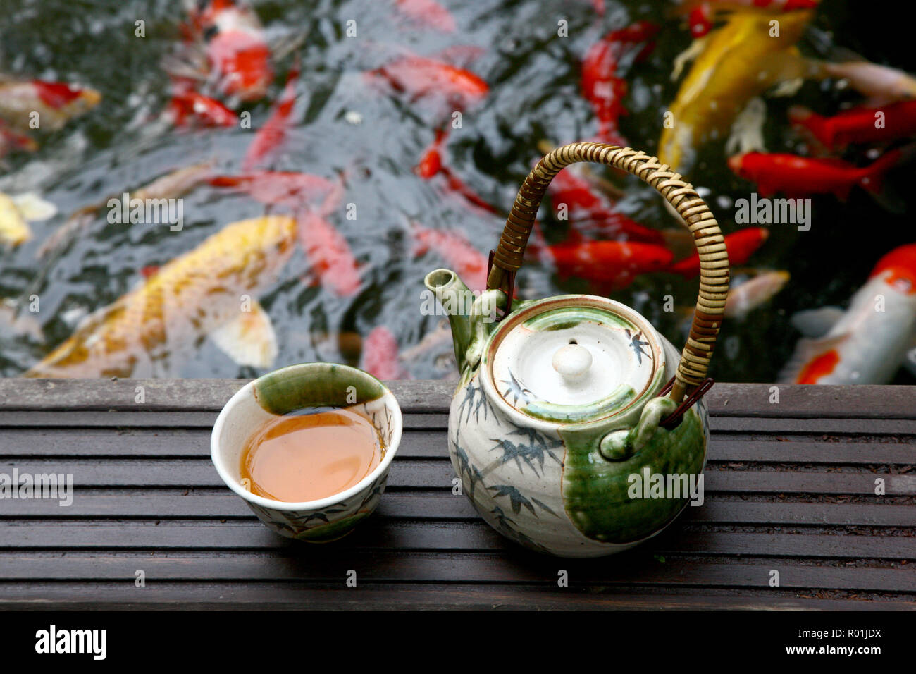 Tea set the goldfish Stock Photo - Alamy