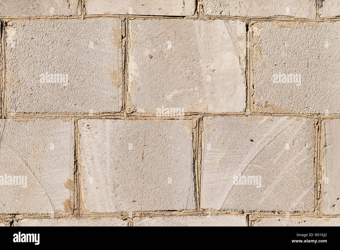 old wall of a building made of large silicate blocks, closeup Stock ...
