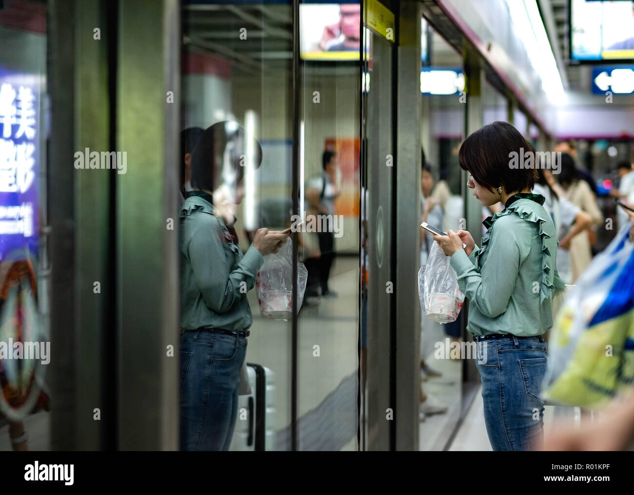 Woman approaching friends hi-res stock photography and images - Alamy