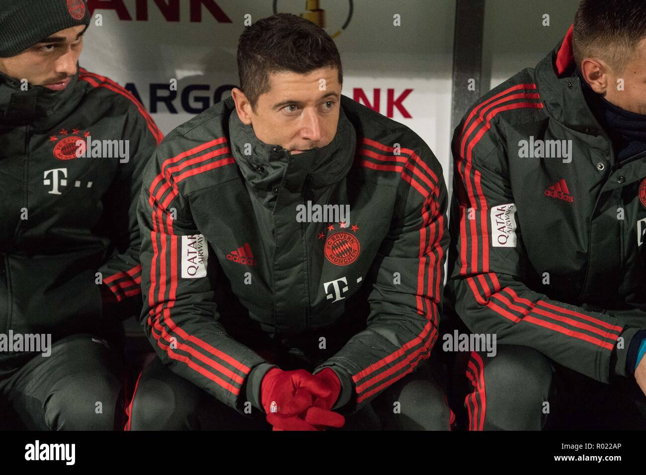 Football players sitting on bench hi-res stock photography and images ...