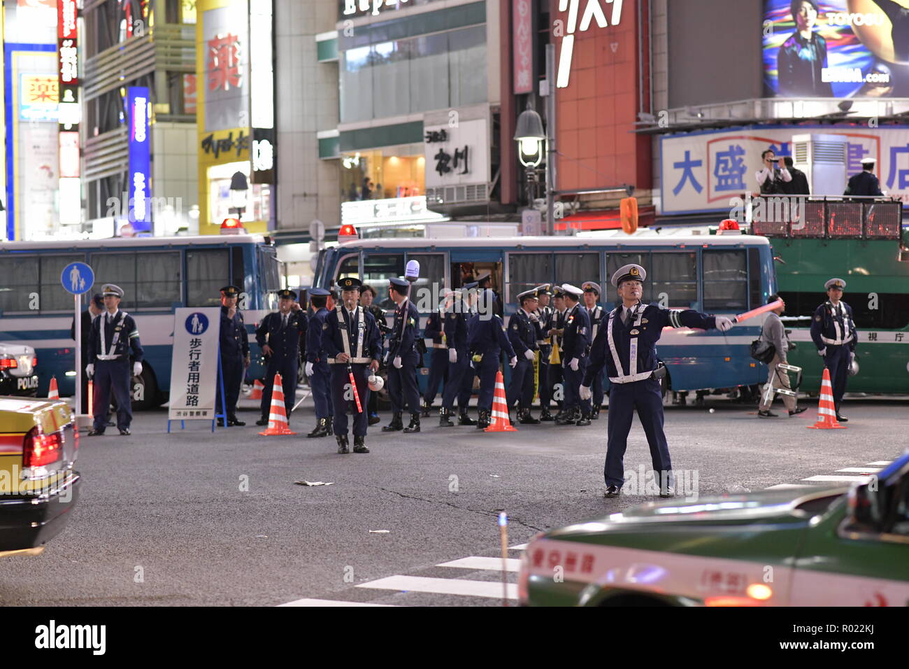 Shibuya, Tokyo, Japan. 31st Oct, 2018. Police officers are deployed as ...