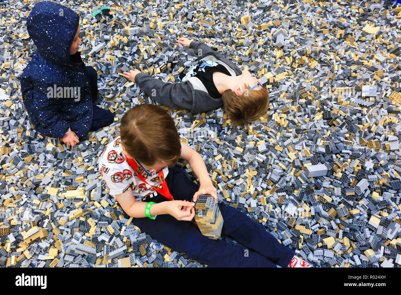 Children playing with lego bricks Stock Photo - Alamy