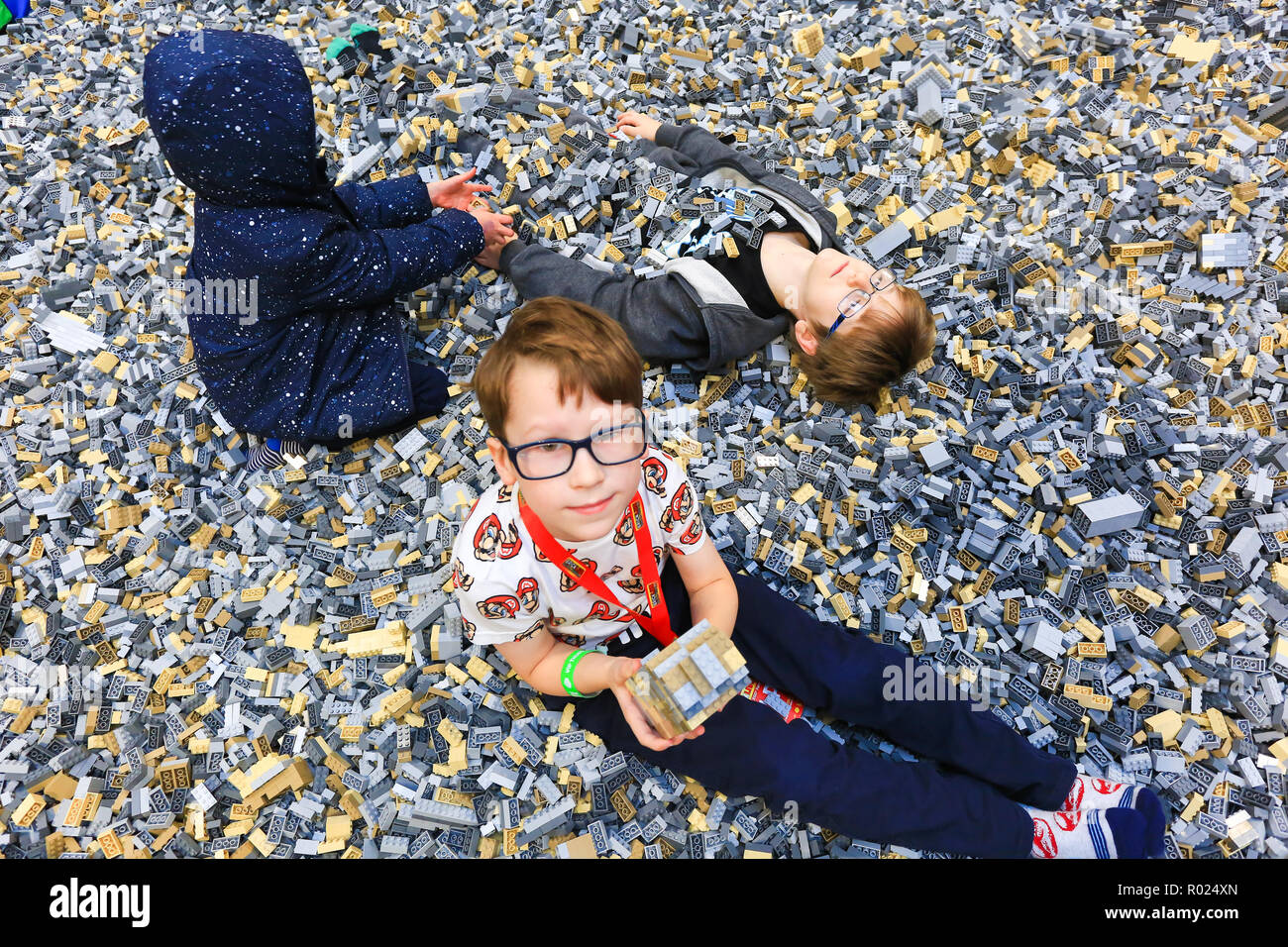 Children playing with lego bricks Stock Photo - Alamy