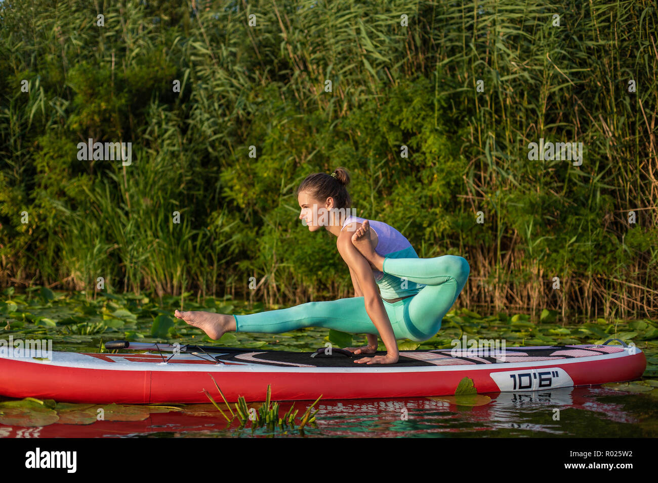 Silhouette girl doing handstand on hi-res stock photography and images ...