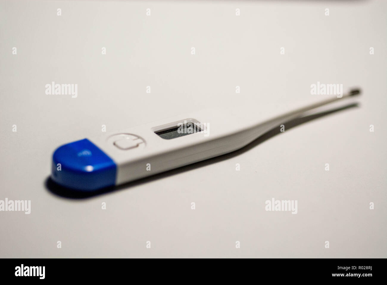 medical thermometer close up on plain white background Stock Photo - Alamy