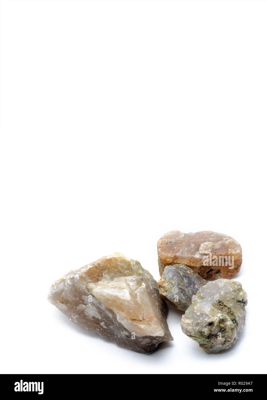 Small granite rock stone on white background Stock Photo - Alamy