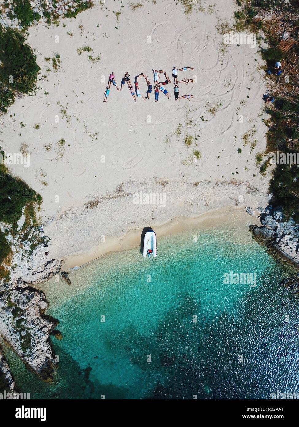 People write their words on the sand with their bodies Stock Photo - Alamy