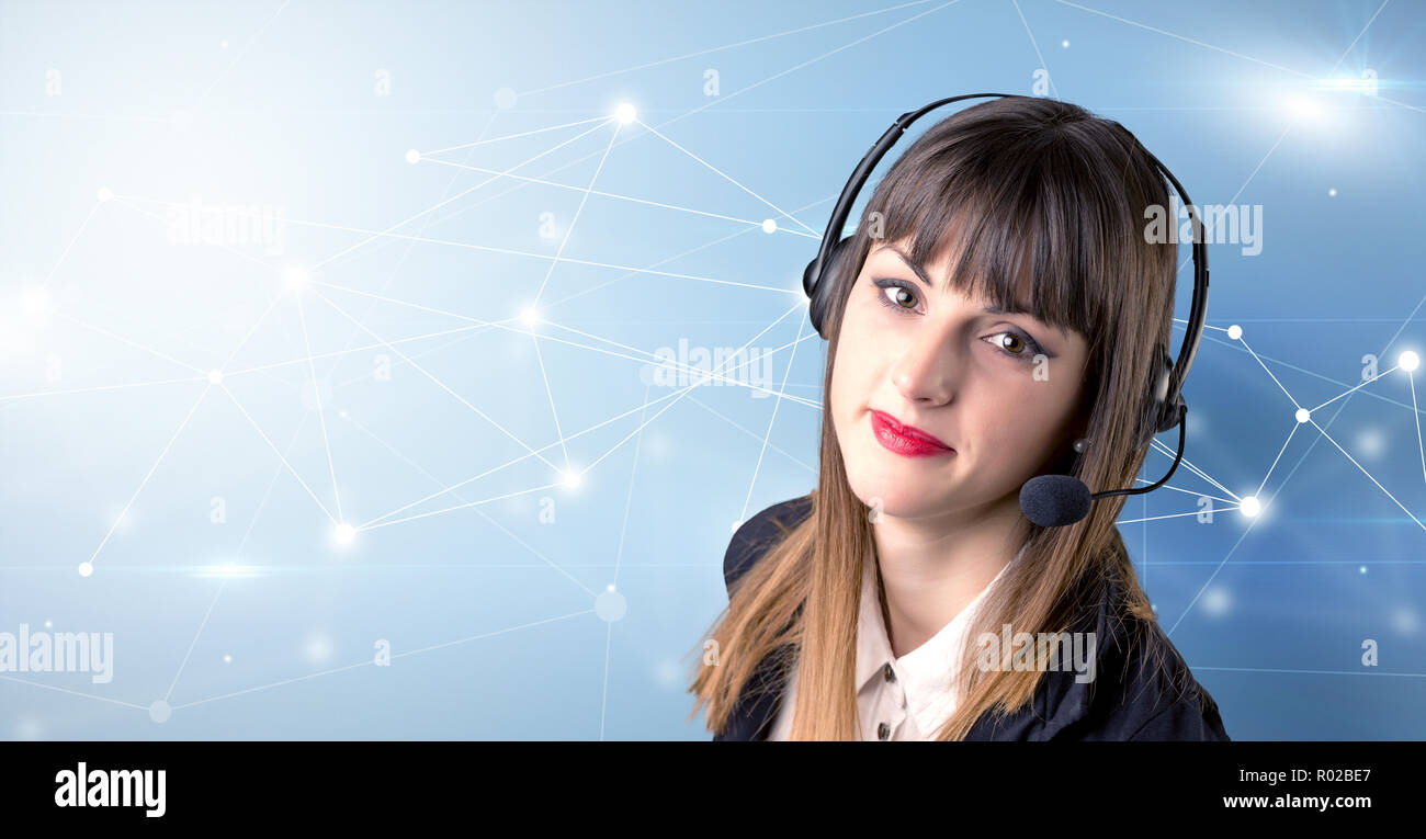 Young female telemarketer with blue background and connectivity concept ...