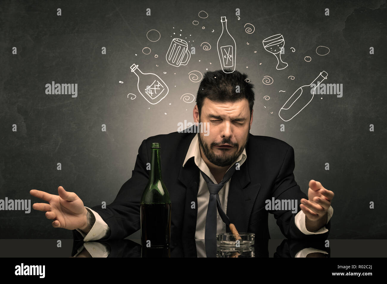 Drunk down and out man with doodle alcohol bottles concept Stock Photo ...