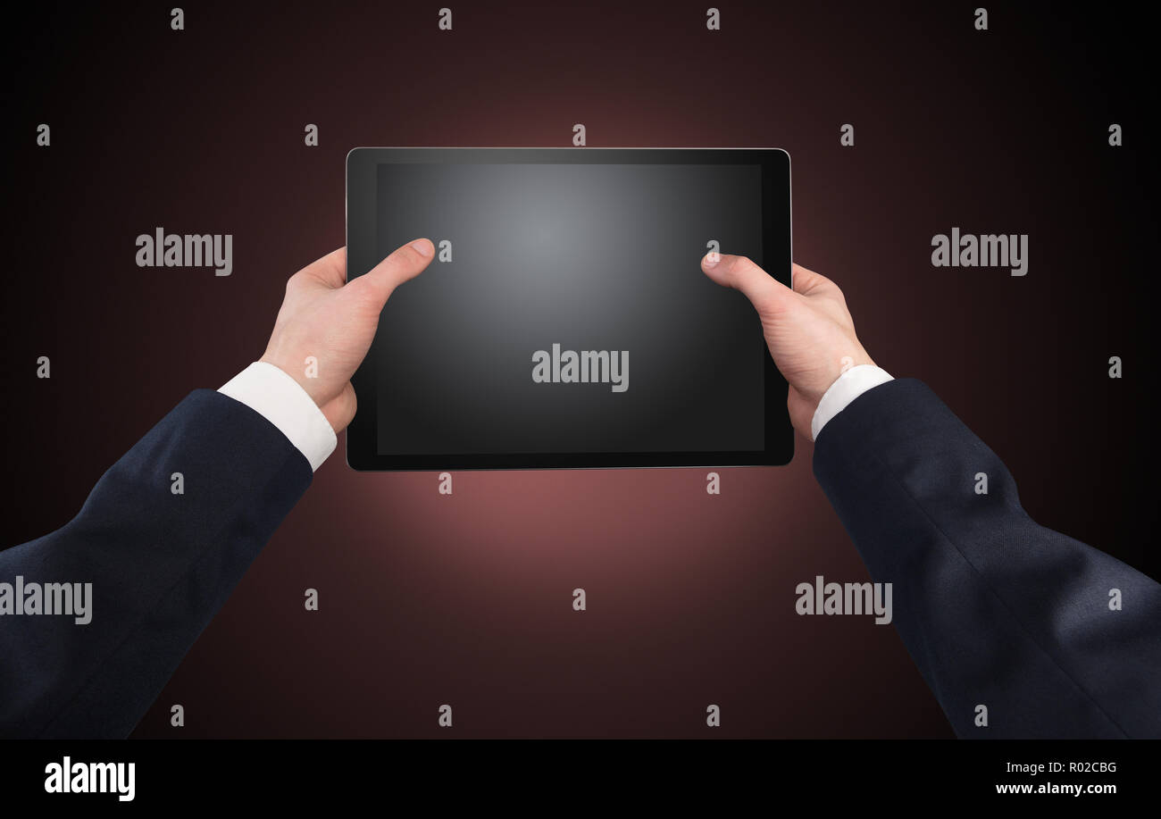 Hand using tablet with no concept and empty space Stock Photo - Alamy