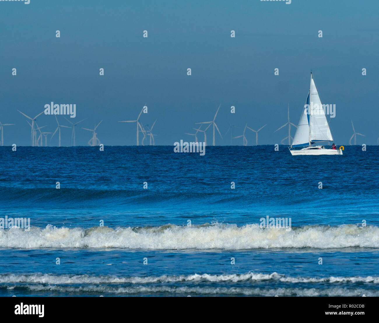 The beach and wind farm at Titchwell RSPB Nature Reserve west Norfolk ...