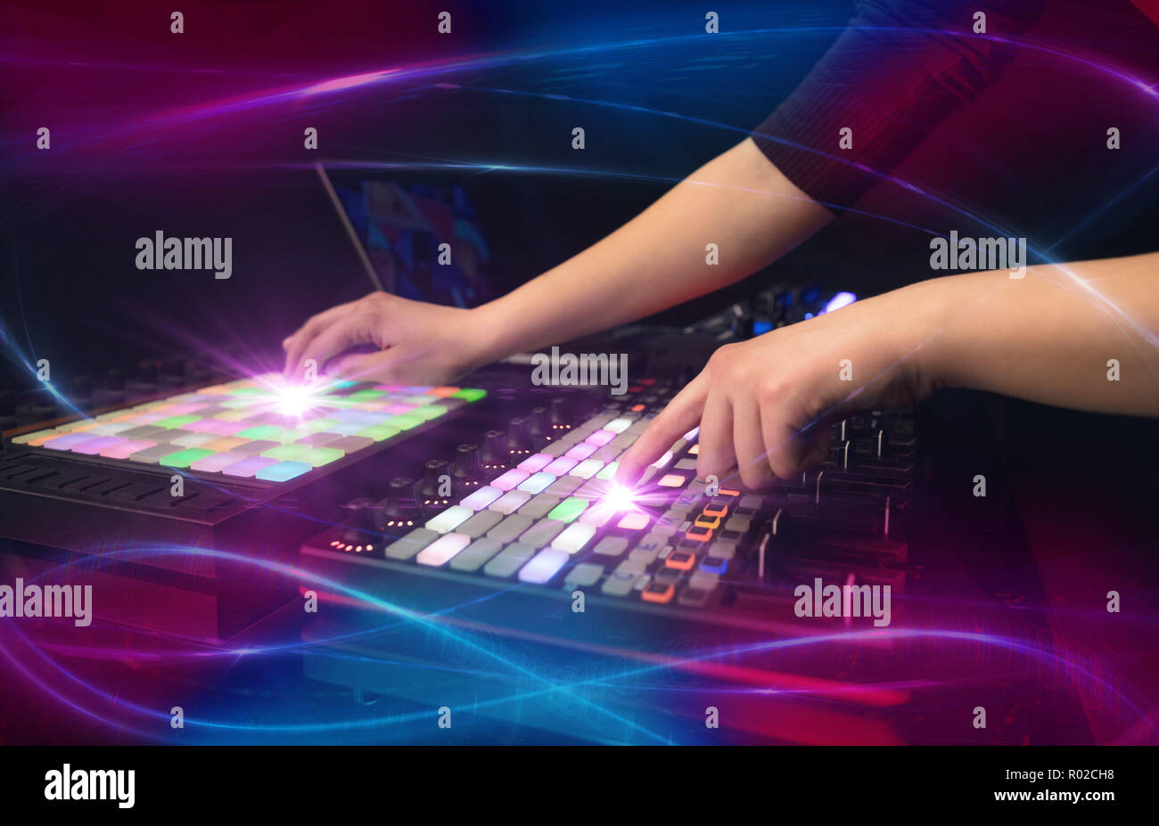 Hand mixing music on midi controller with wave vibe concept Stock Photo ...