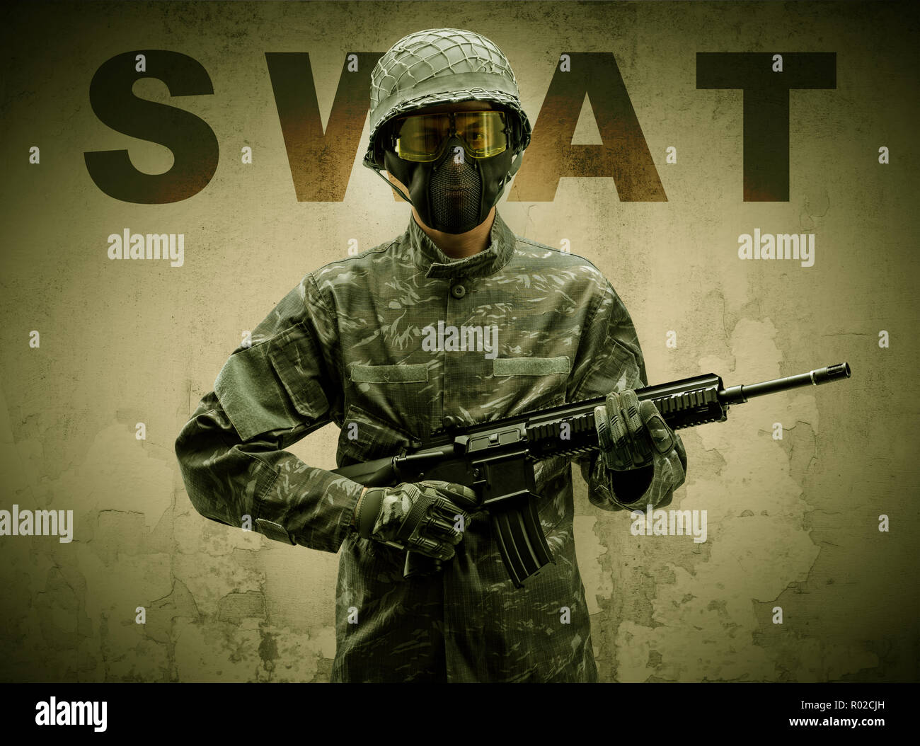 Uniformed armed soldier with damaged wall background Stock Photo - Alamy