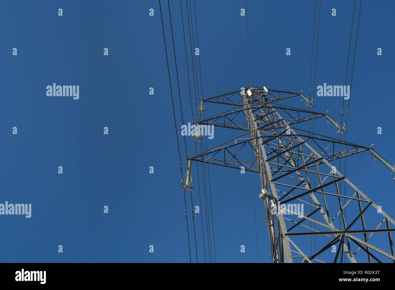 UK high voltage electricity pylon. Showing arcing horns, glass ...