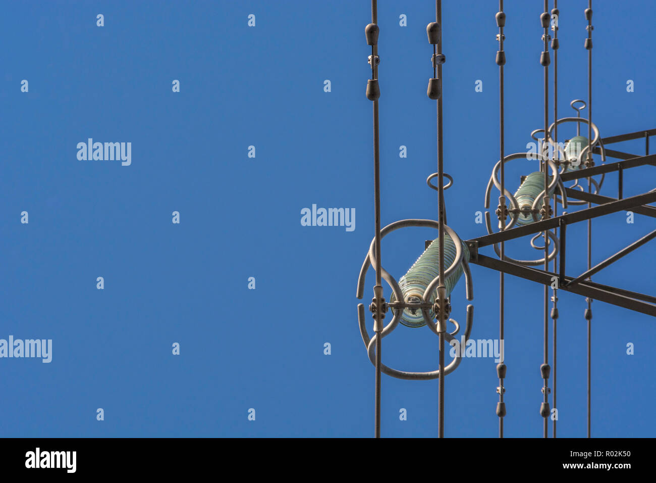 UK high voltage electricity pylon. Showing arcing horns, glass ...