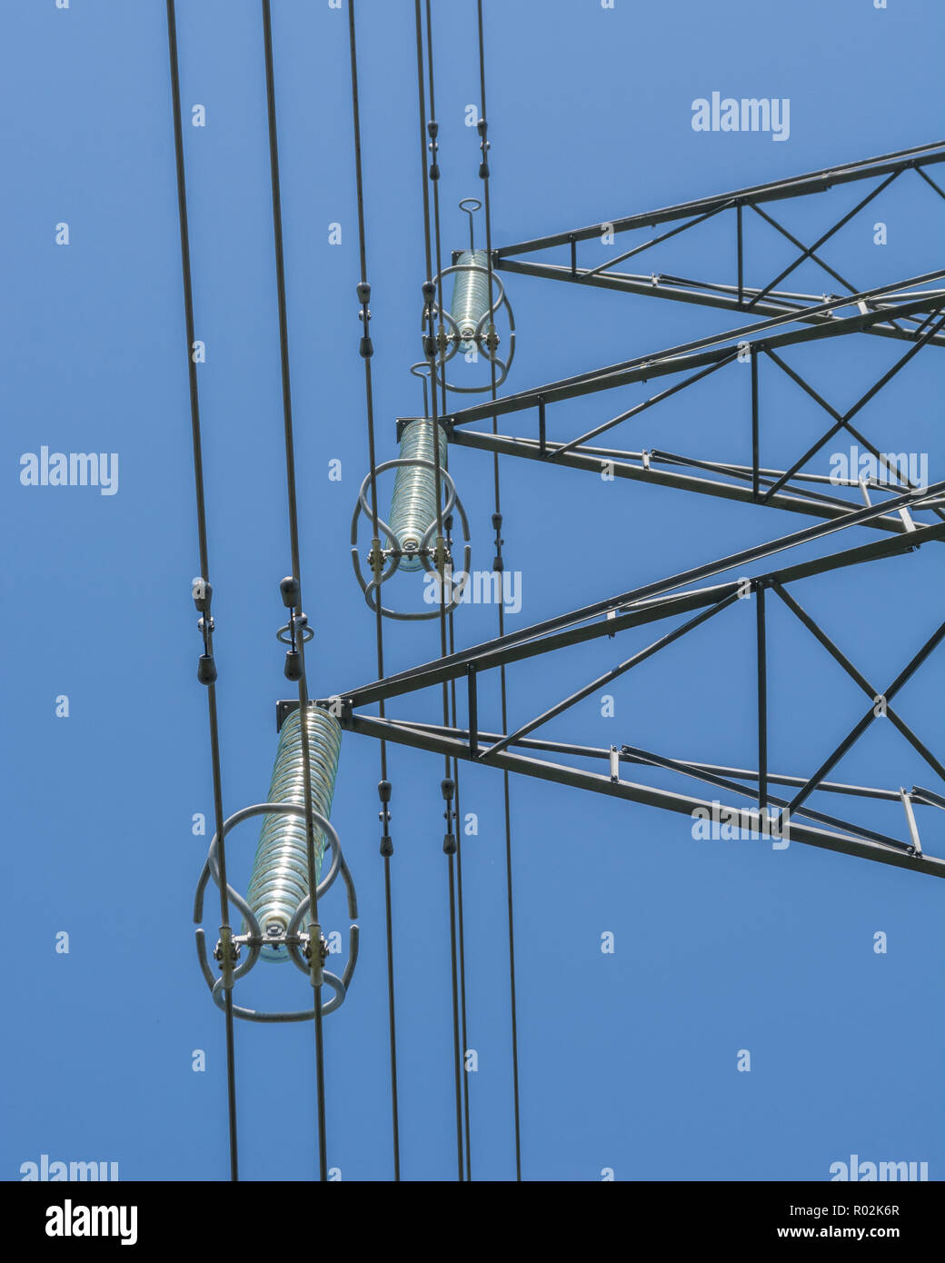 UK high voltage electricity pylon. Showing arcing horns, glass ...
