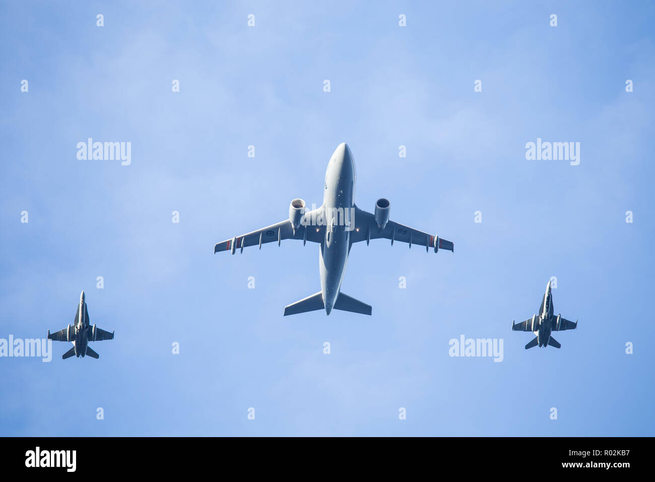 An Canadian tanker CC-150 and two Spanish F-18s fly in opening from DV ...