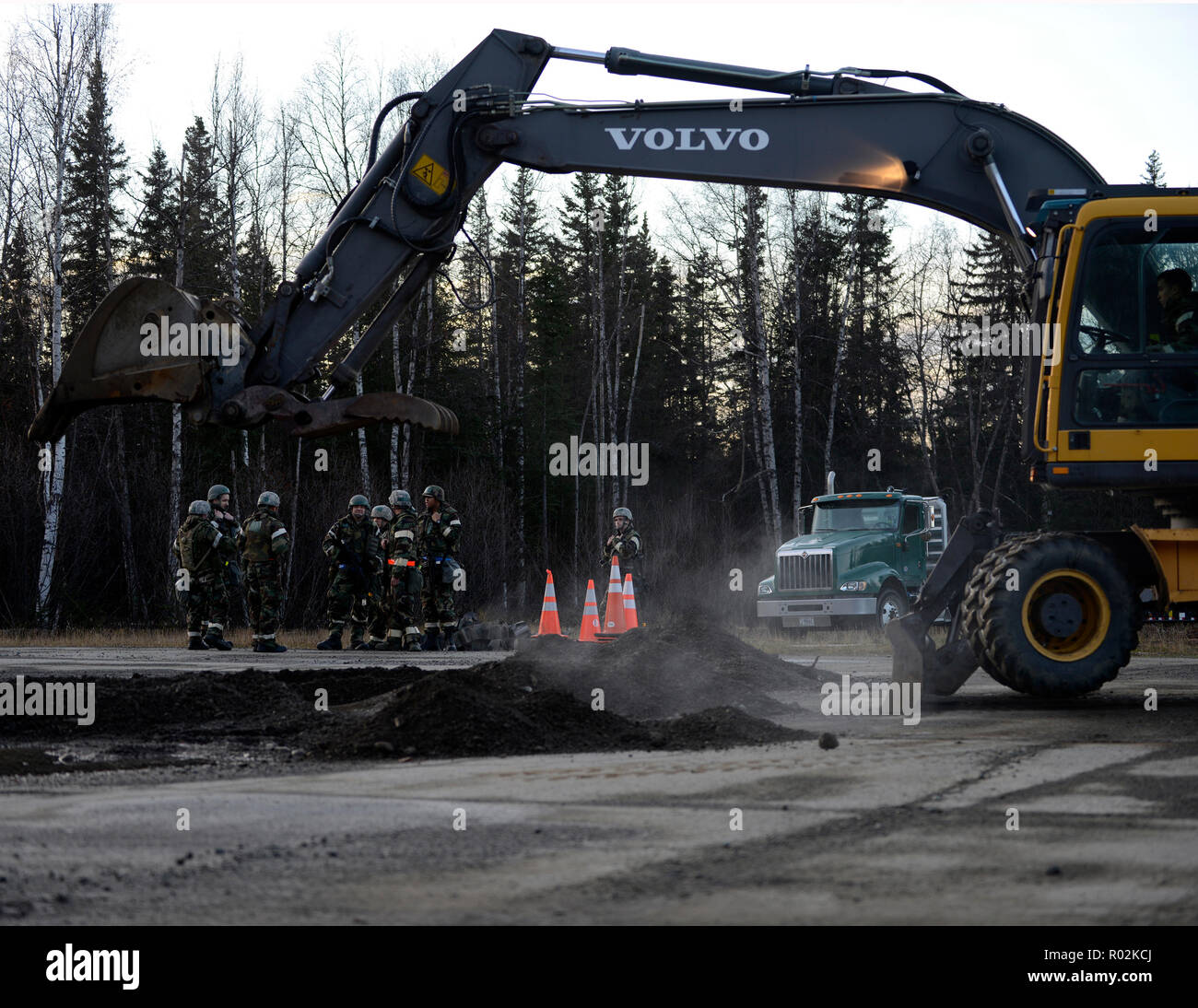U.S. Airmen with the 773d Civil Engineer Squadron repair damage on a ...