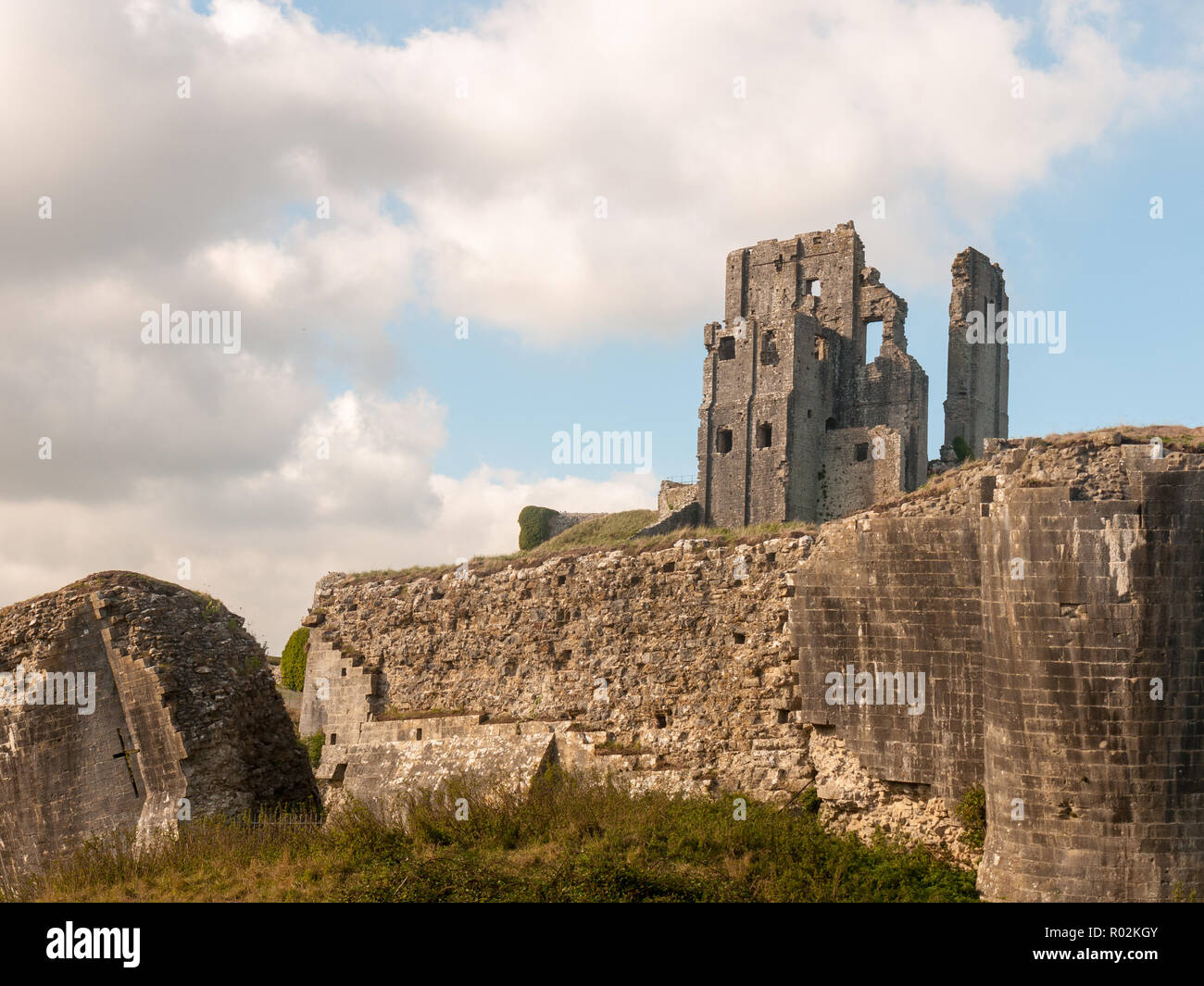 beautiful corfe castle dorset daytime summer light blue sky castle ...